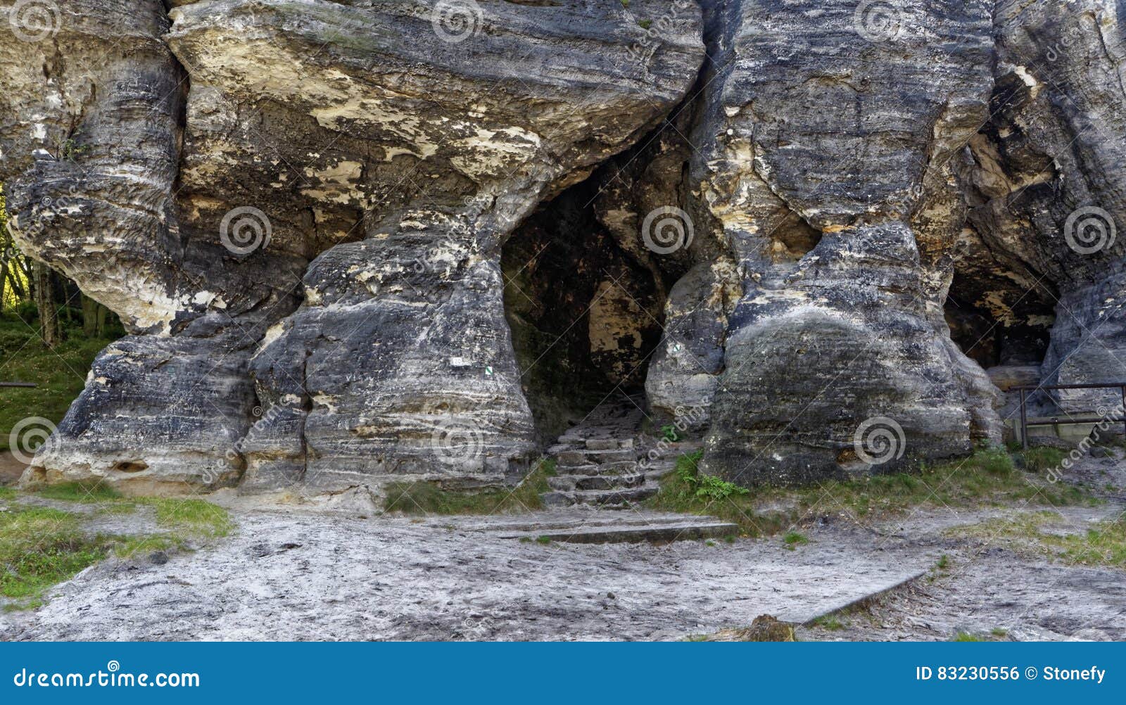 Natural Caves Formed within Tall Rock Structures Stock Photo - Image of ...
