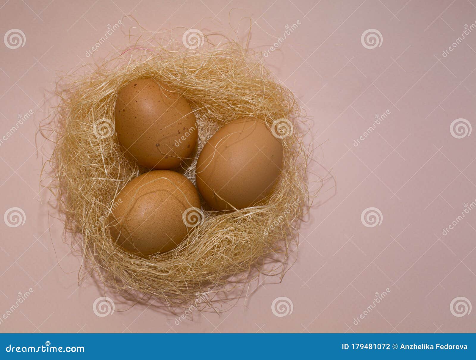 Natural Chicken 3 Eggs, Front View. in a Nest of Hay on a Beige ...