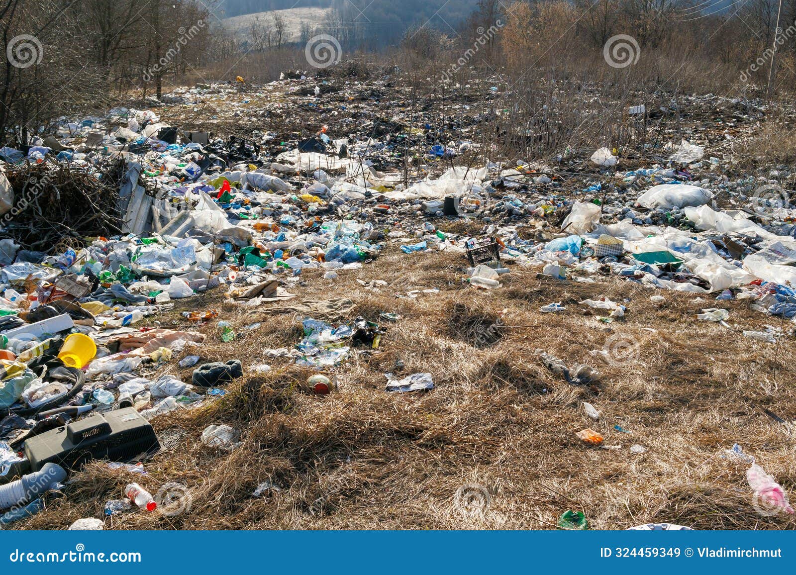 A Natural Dumping Ground for Garbage, Used Plastic Bottles, Bags and ...