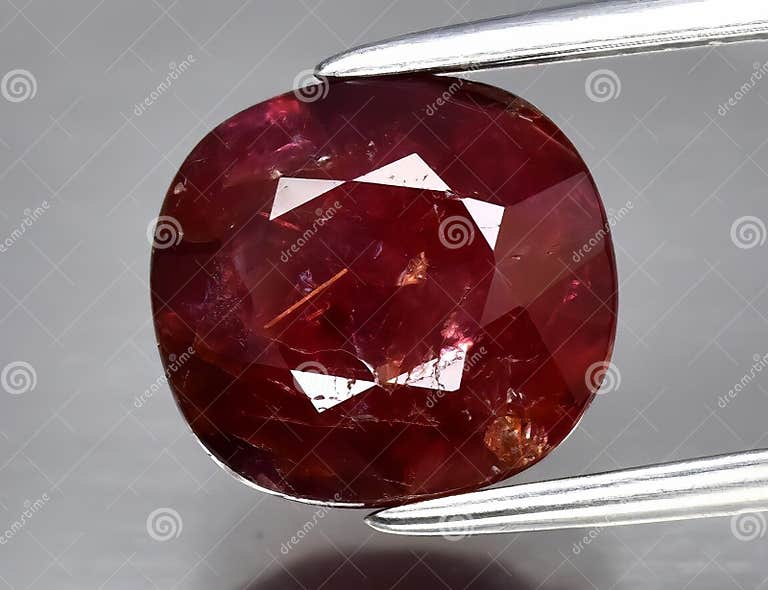 Natural Gemstone Red Ruby on Gray Background Stock Photo - Image of ...