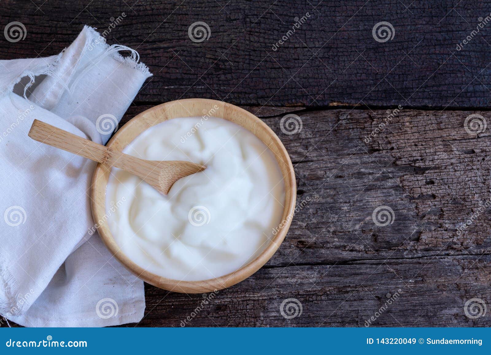 Natural Homemade Plain Organic Yogurt in Wood Bowl on Wood Texture ...