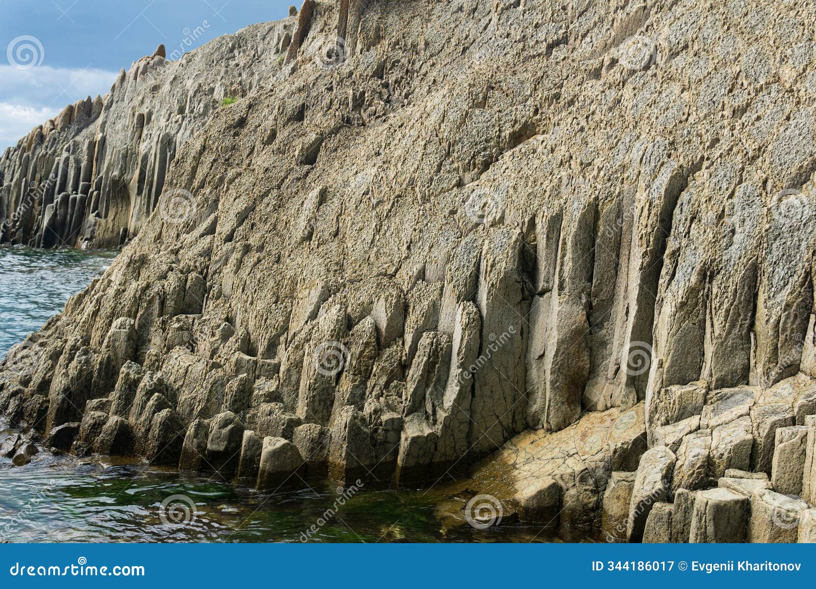 Natural Landscape with a Sheer Cliff Folded Columnar Basalt on the ...