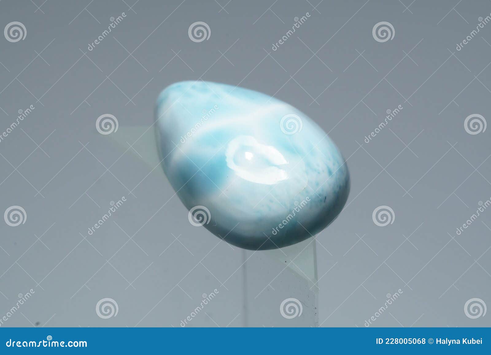Natural Larimar Stone on a Stand on a White Background Stock Photo ...