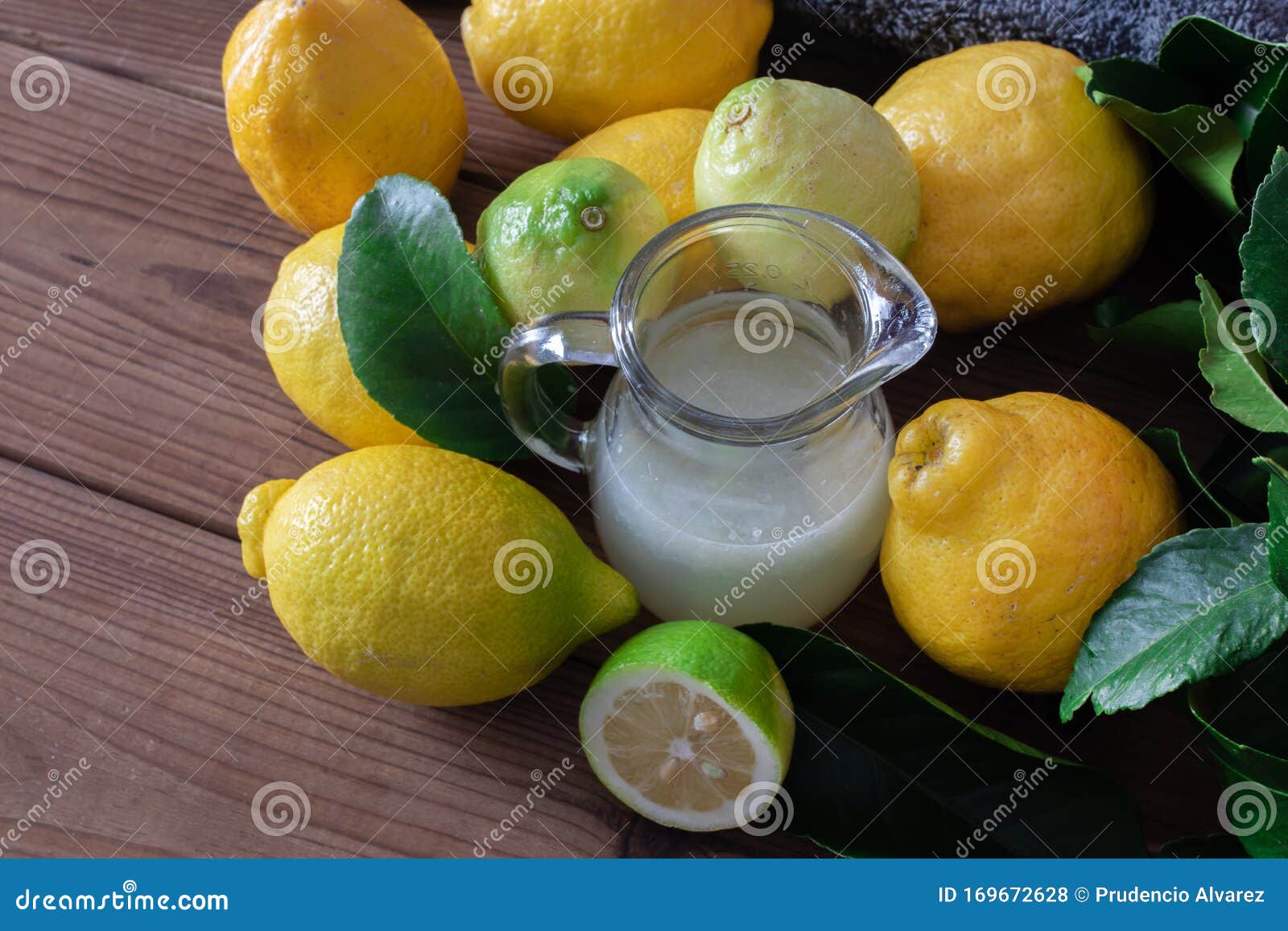 Natural Lemons with Lemon Juice Stock Photo - Image of lemon, closeup ...