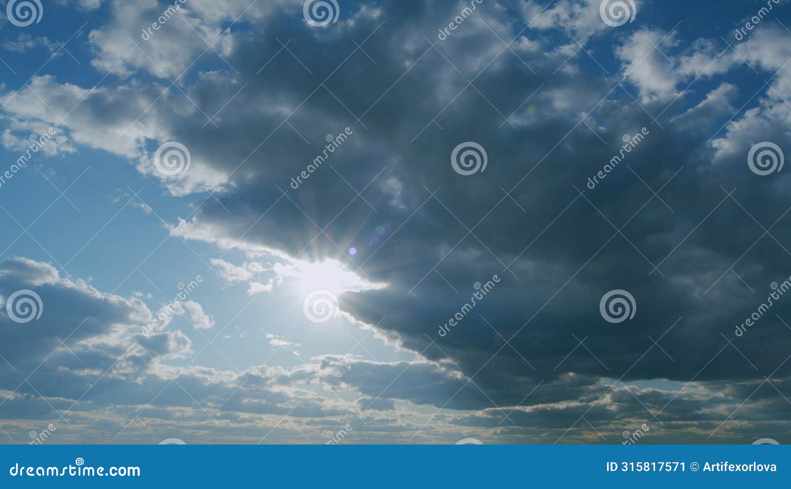 Natural Light Rays Shining through the Glittering Clouds. Sky with ...