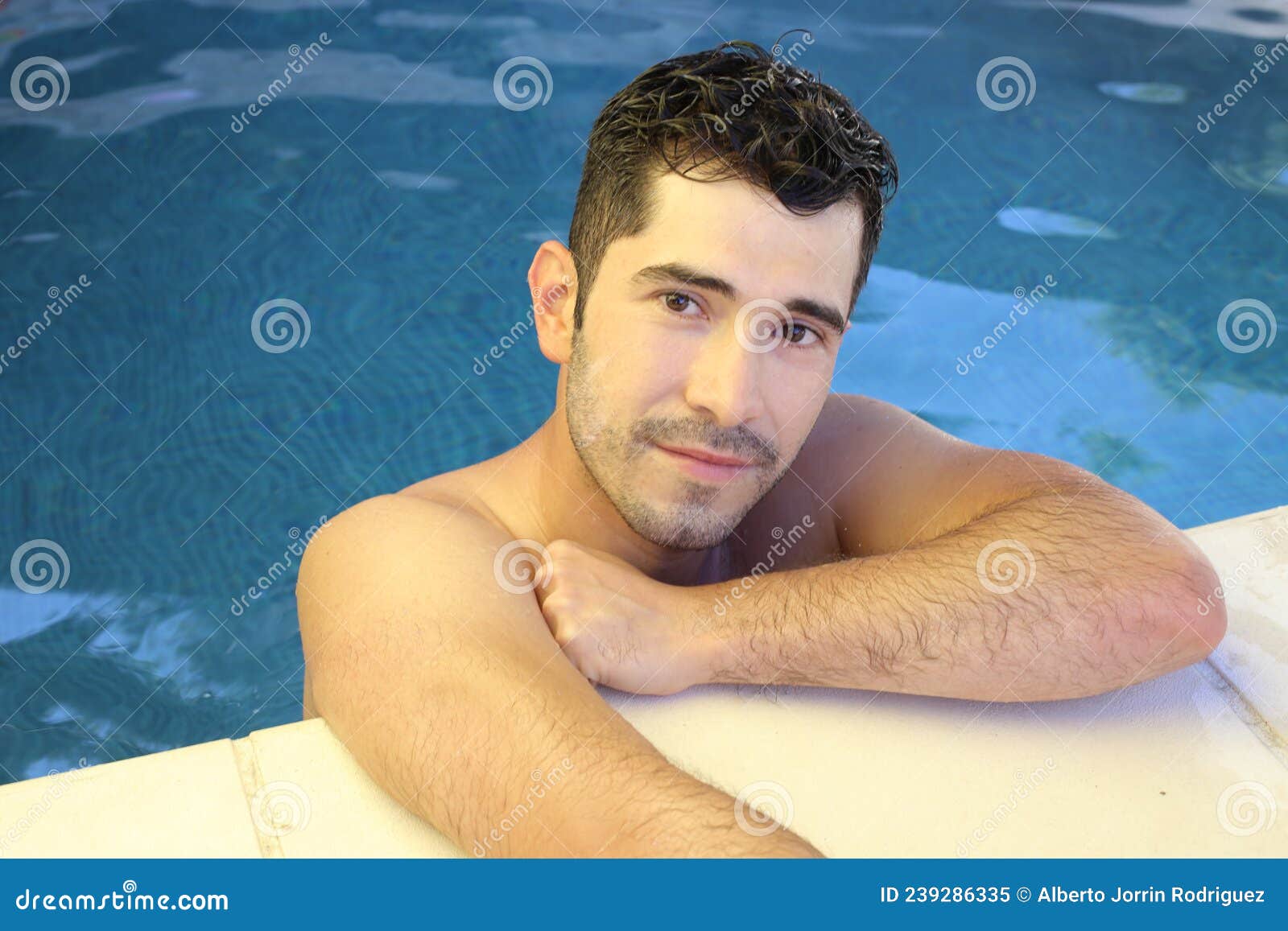 Natural Looking Young Man in Swimming Pool Stock Image - Image of ...