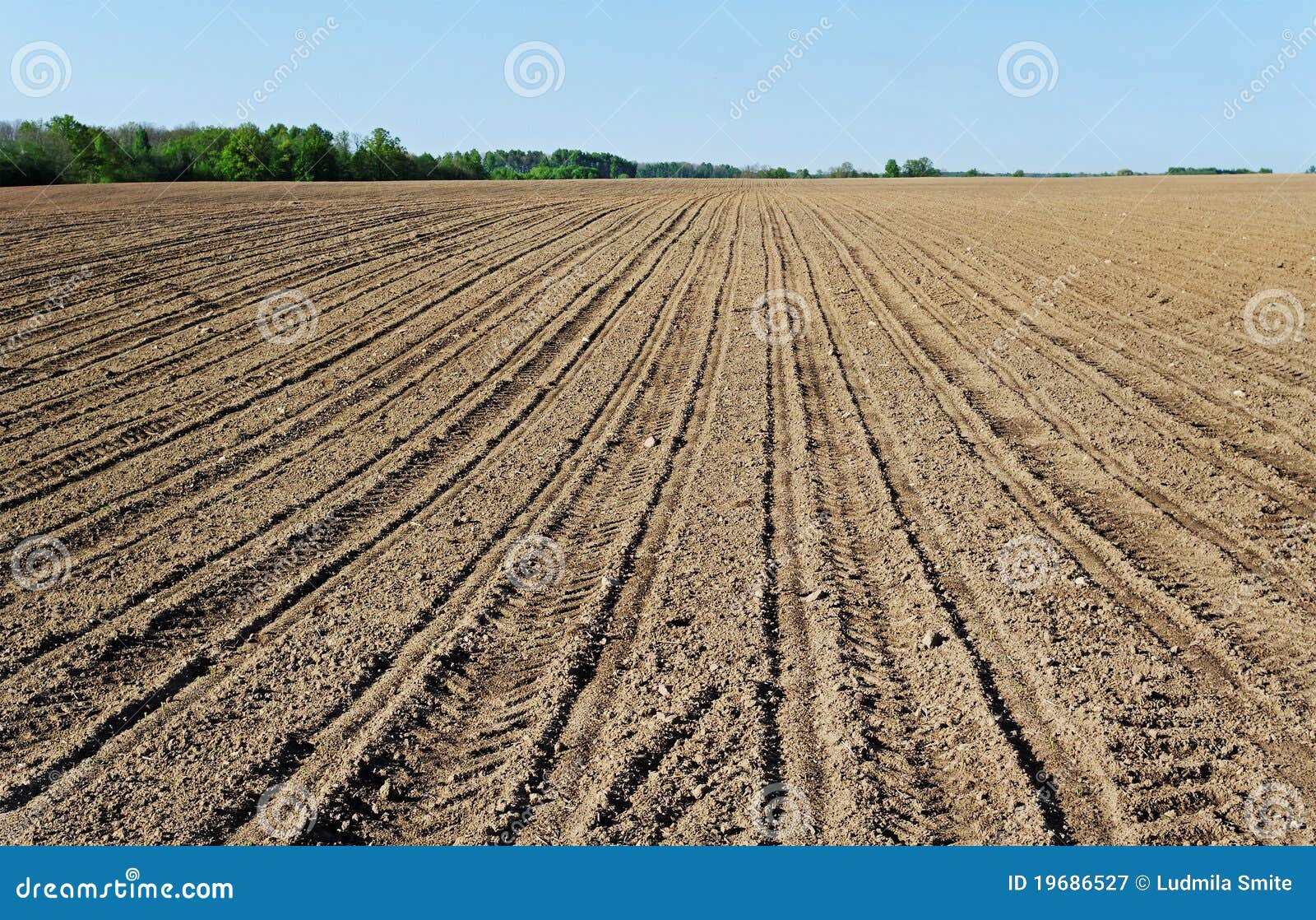 Natural plowed field. stock image. Image of farmland - 19686527