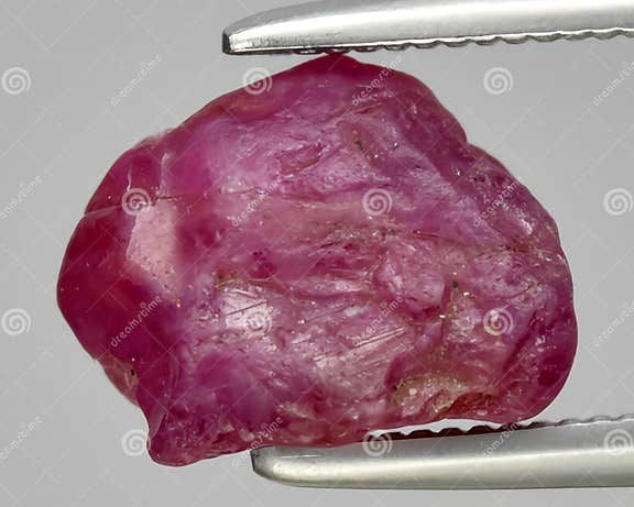 Natural Red Ruby Rough Gem on the Background Stock Photo - Image of ...