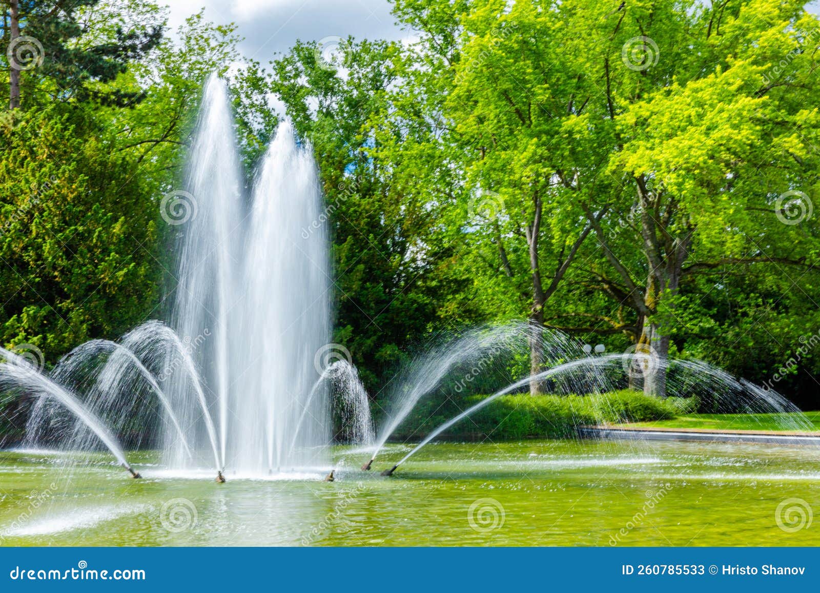 Natural Scenery on Lake with Fountain and Spring Trees Stock Image ...