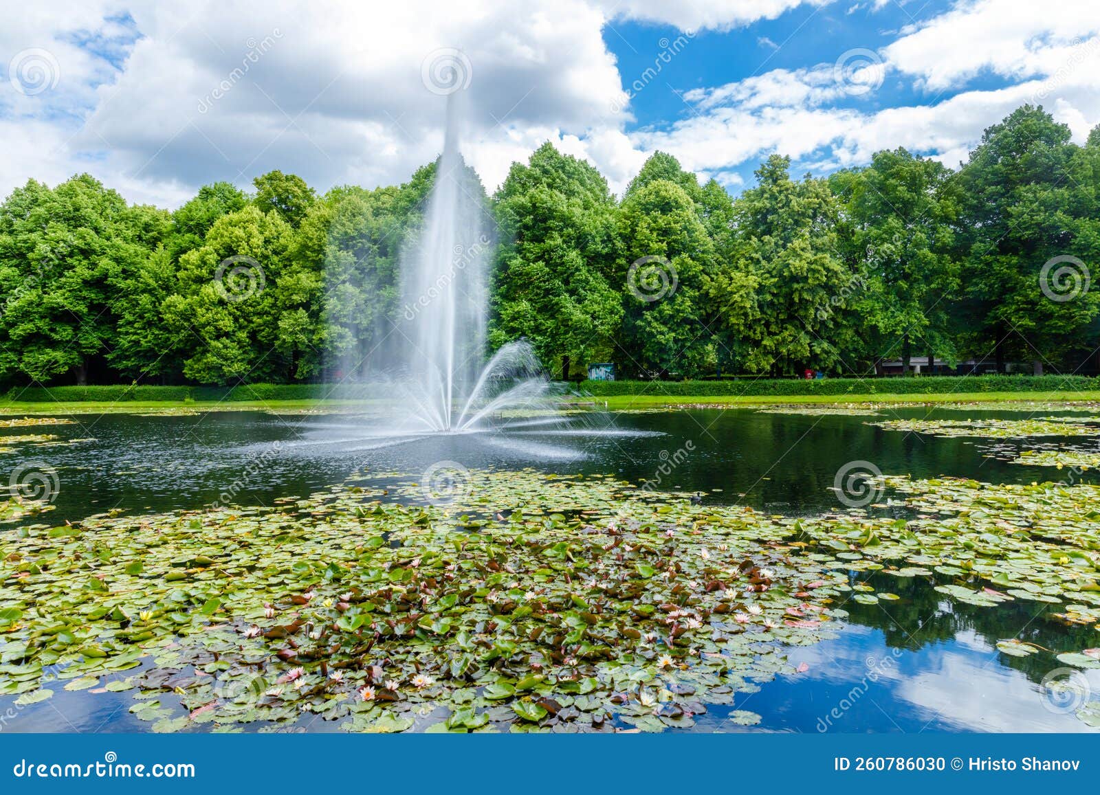 Natural Scenery on Lake with Fountain and Spring Trees Stock Photo ...
