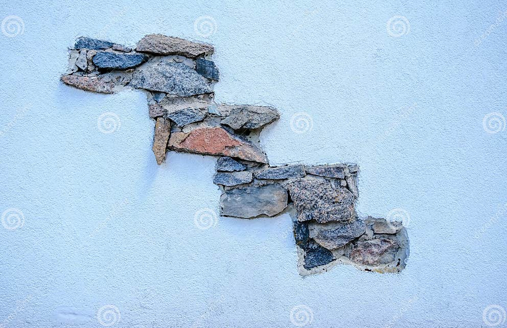Natural Stone Embedded in the Wall of the House. Stock Photo - Image of ...