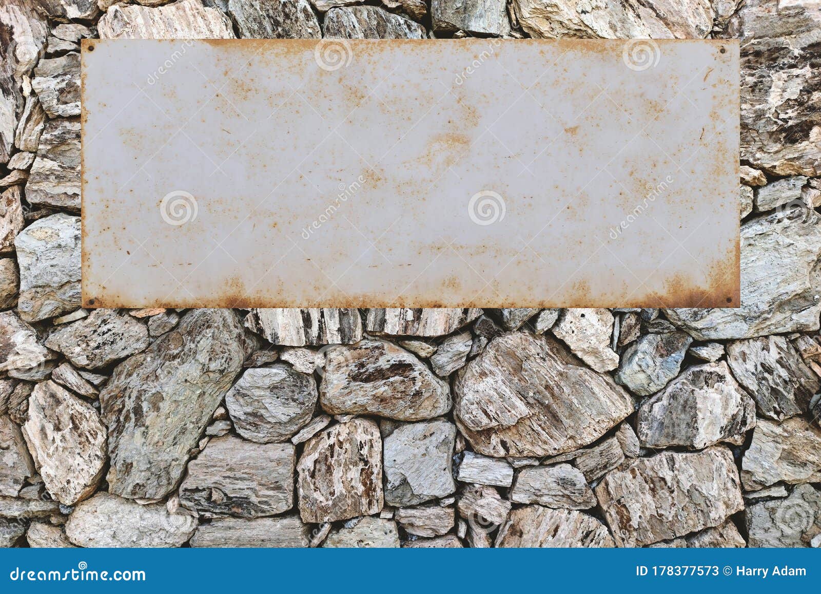 Natural Stone Wall with Metal Shield, Copy Space Stock Image - Image of ...