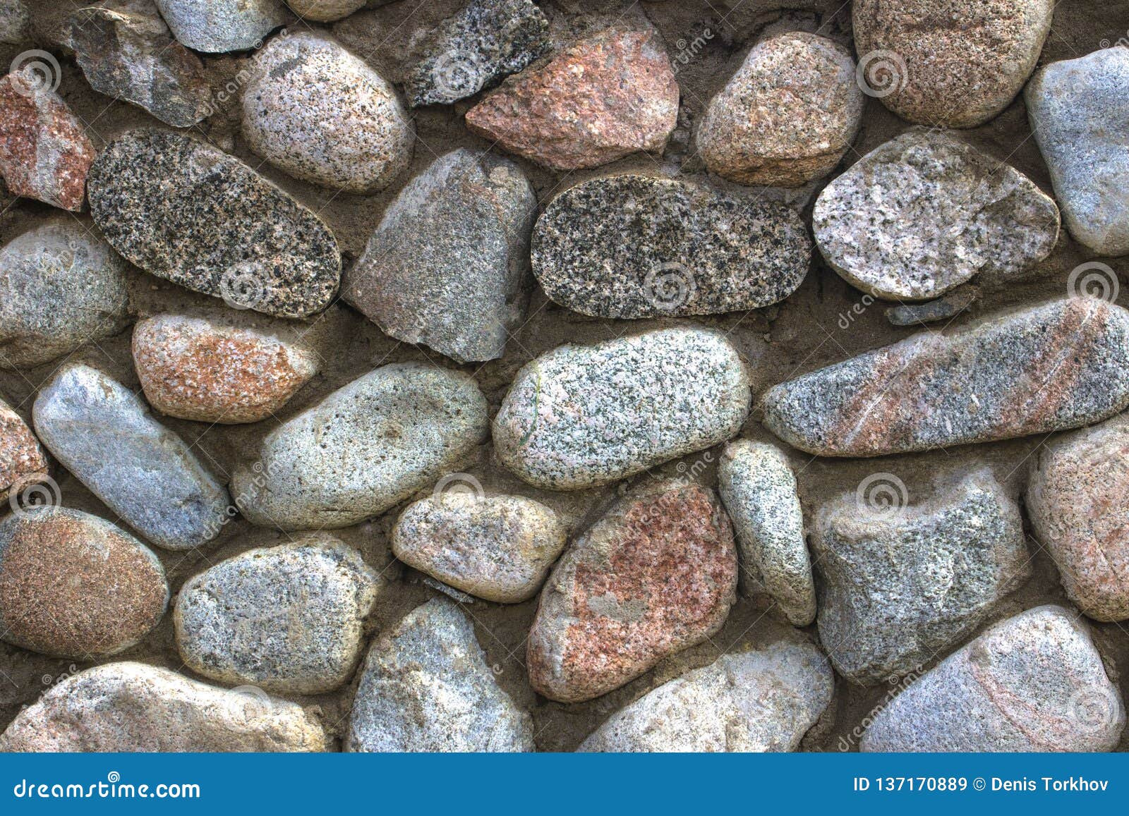 Natural Stone Wall of Round Stone, Front and Back Background Blurred ...