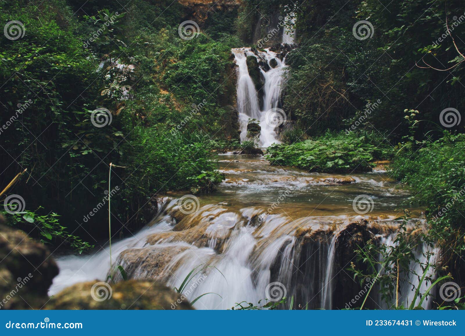 Natural View of Water Flowing Downstream from Waterfalls in a Forest ...