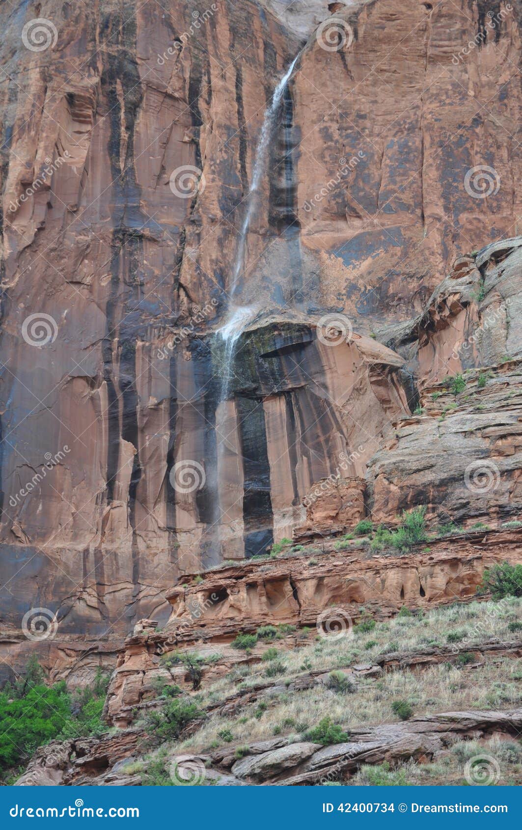 Natural Waterfall Off Moab Rocks Stock Photo - Image of waterfall ...