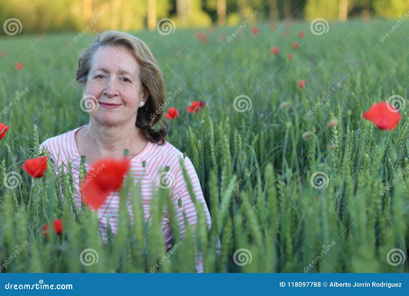 Natural 60 Years Old Lady in Nature Stock Photo - Image of face, green ...