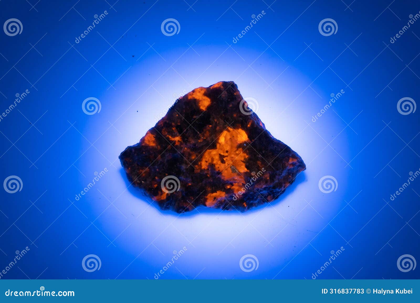 Natural Yooperlite Gem Stone in Uv Light on the White Background Stock ...