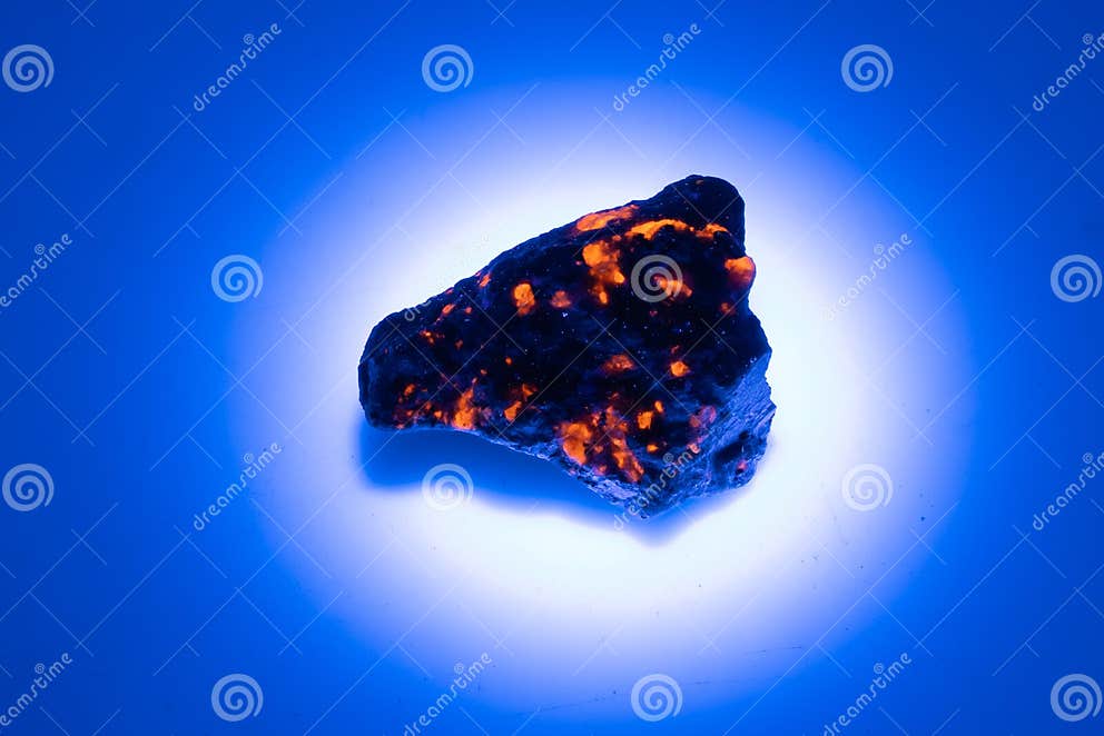 Natural Yooperlite Gem Stone in Uv Light on the White Background Stock ...