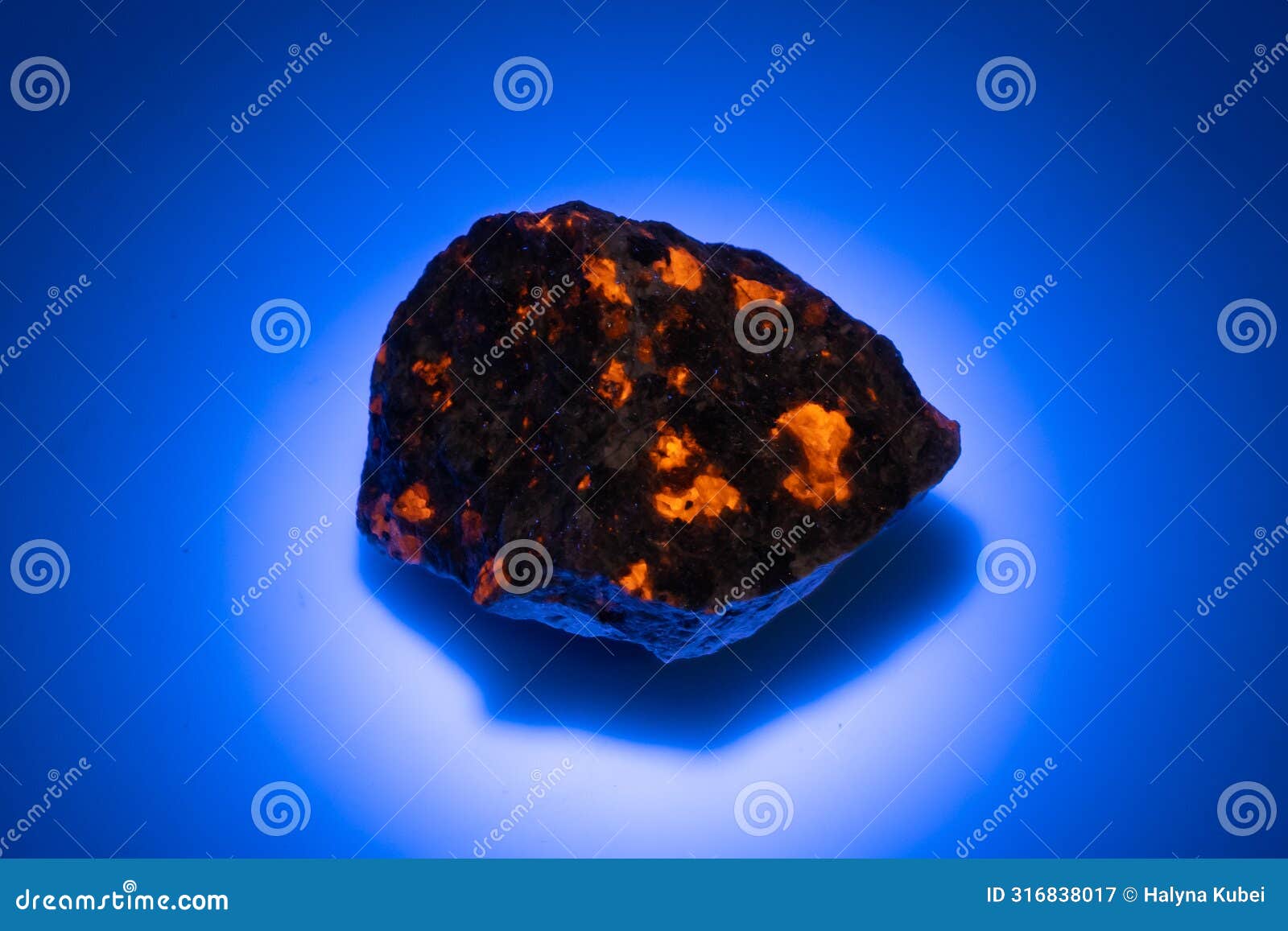 Natural Yooperlite Gem Stone in Uv Light on the White Background Stock ...