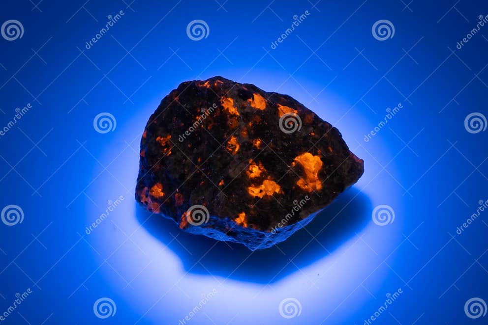 Natural Yooperlite Gem Stone in Uv Light on the White Background Stock ...