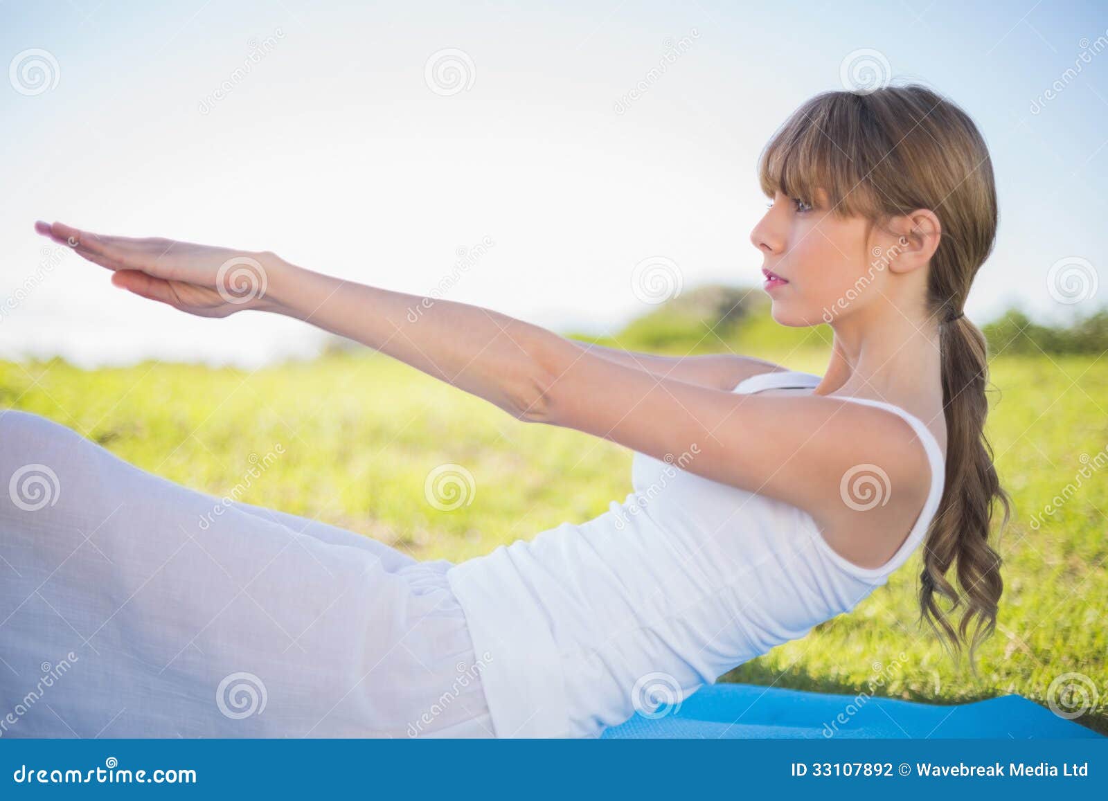 Natural Young Woman Exercising Stock Photo - Image of calm, grassland ...