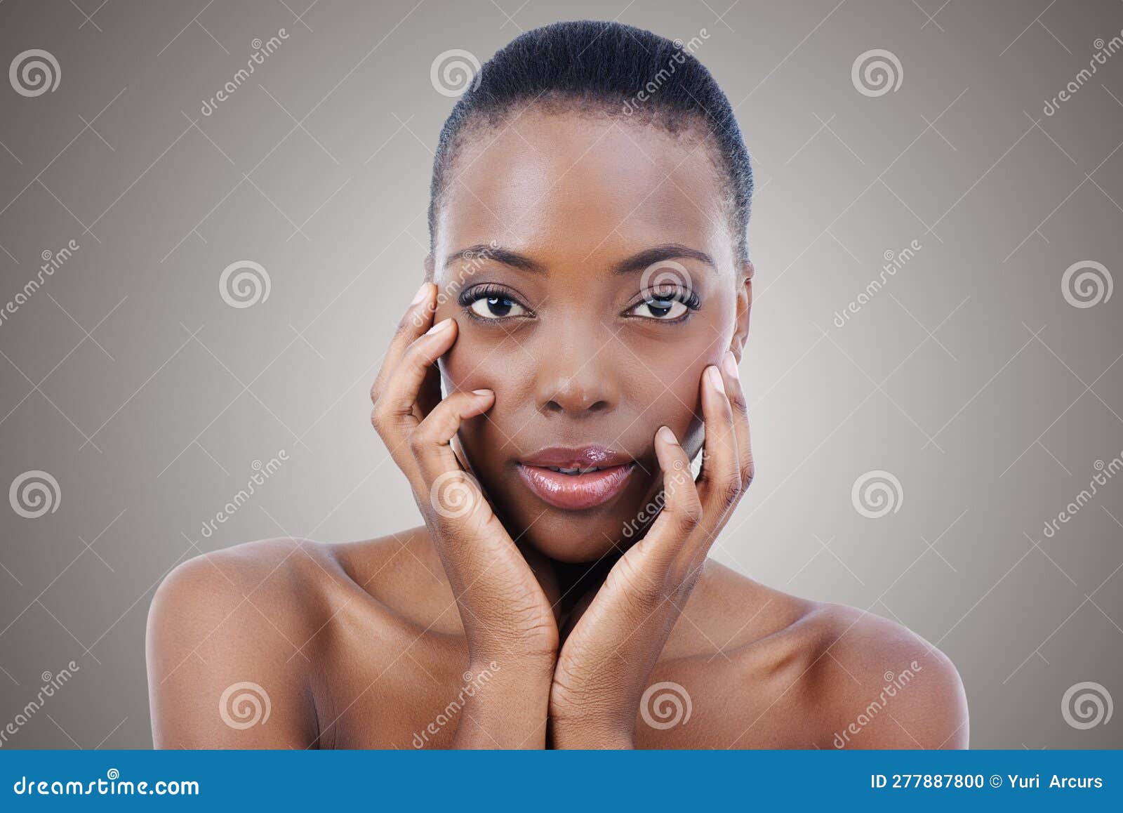 Naturally Alluring. Studio Shot of a Beautiful African American Model ... Naturally Alluring. Studio Shot of a Beautiful African American Model ...