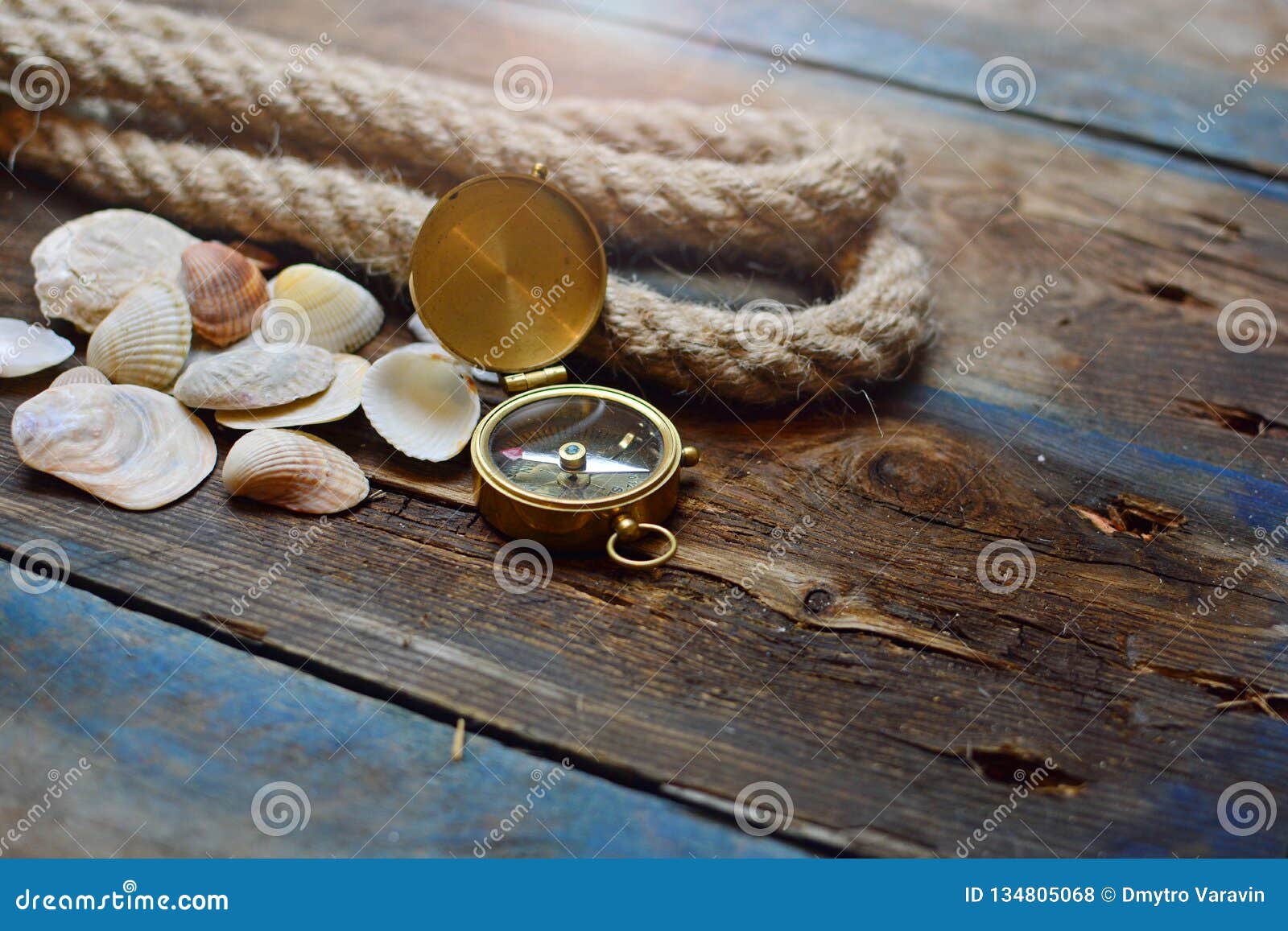 Nautical Background. Old Deck with Rope, Compass and Shells Stock Photo ...