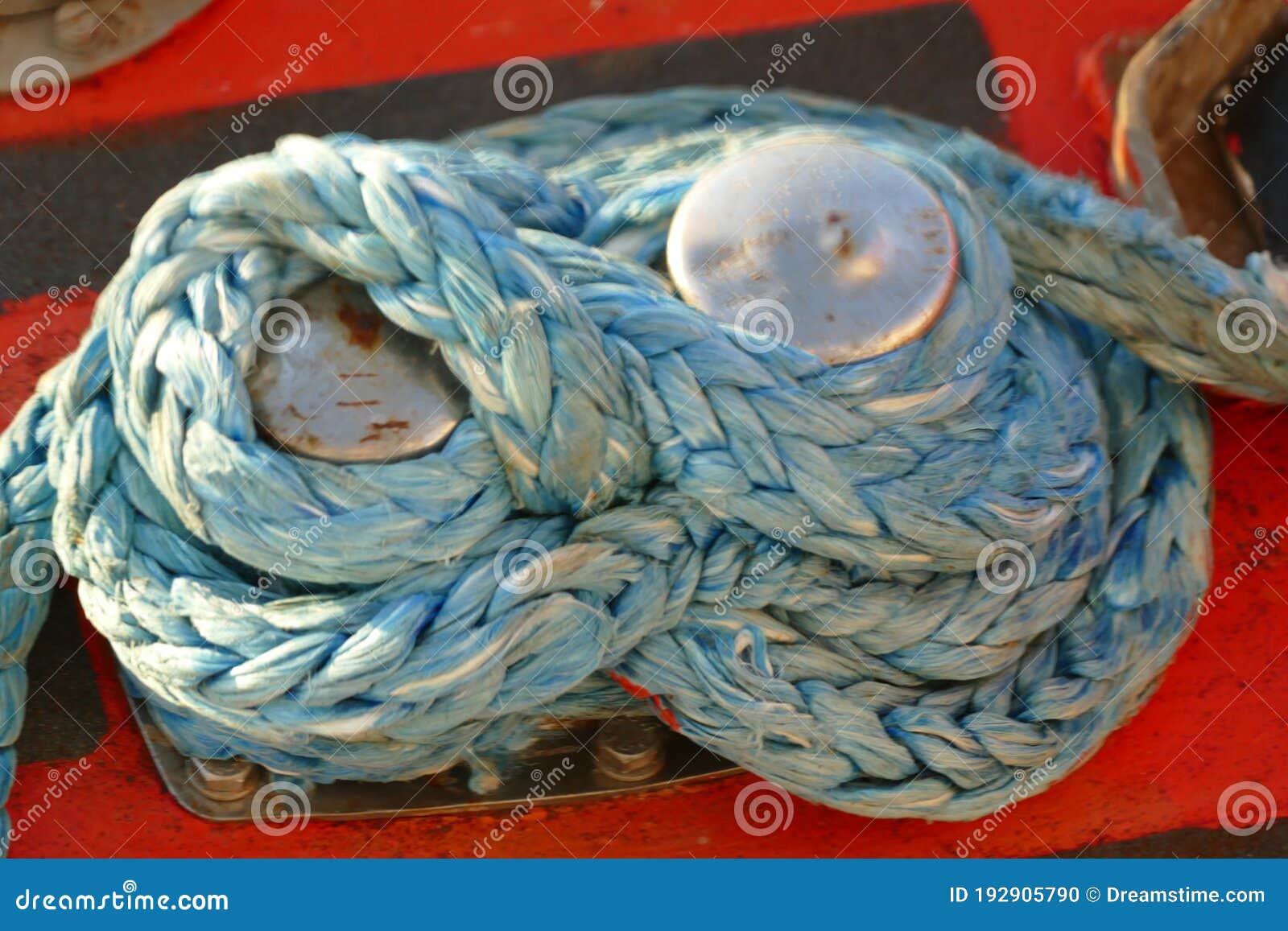 Nautical Cleats Wrapped with Blue Rope Stock Photo - Image of orange ...