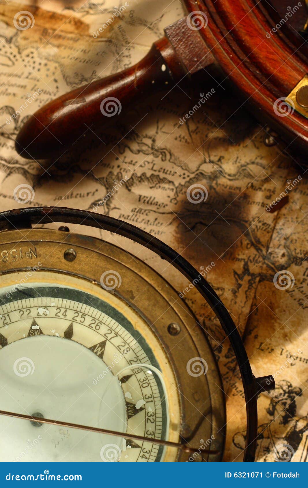 Nautical compass and wheel stock image. Image of journey - 6321071