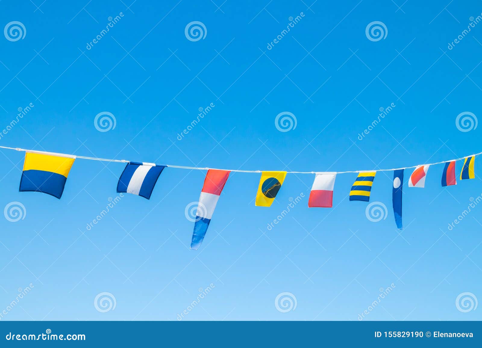 Nautical Flags on the Ship Against Blue Sky Stock Photo - Image of rope ...