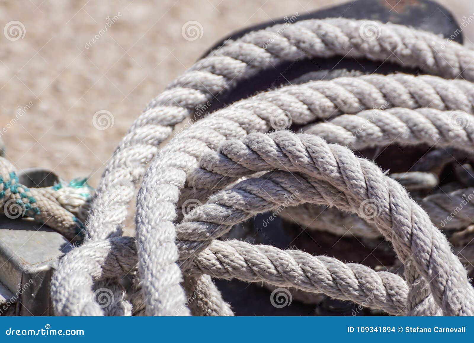 Nautical Rope Rolled on the Pier in a Random Way . Stock Photo - Image ...