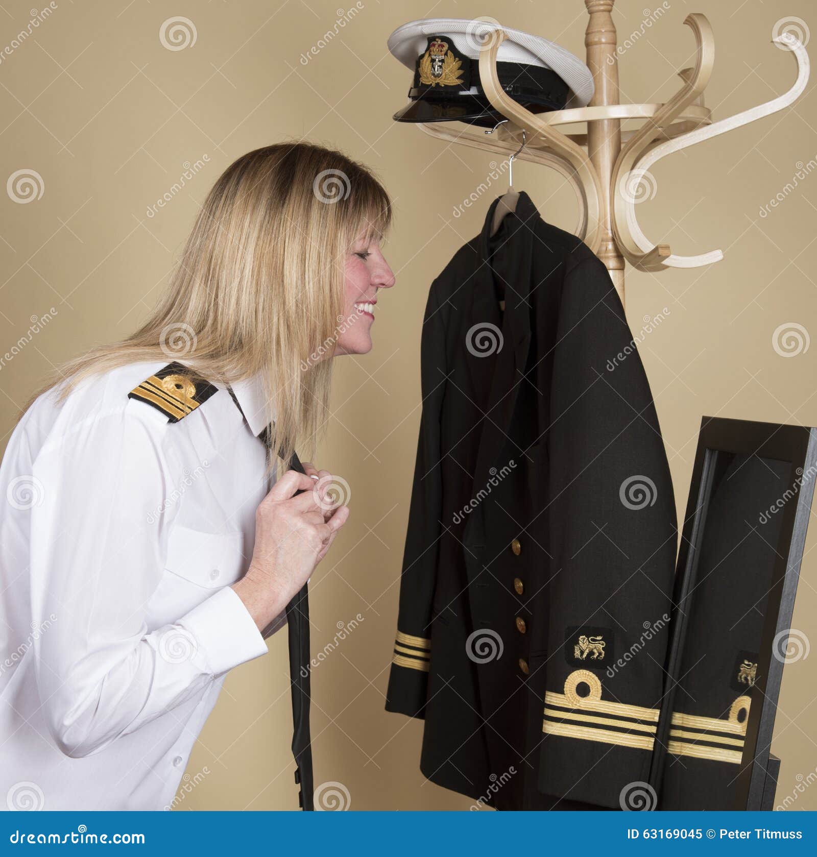 Naval Officer Tying Her Tie Stock Image - Image of badge, aged: 63169045