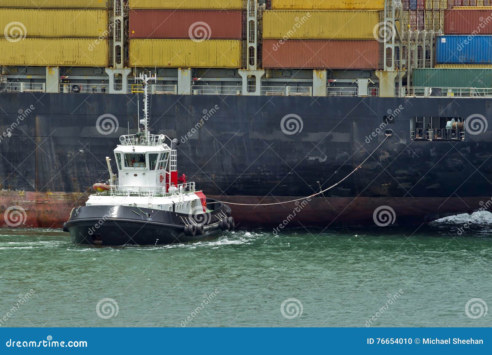 Naval Tug Moving a Container Ship Stock Photo - Image of ship, movement ...