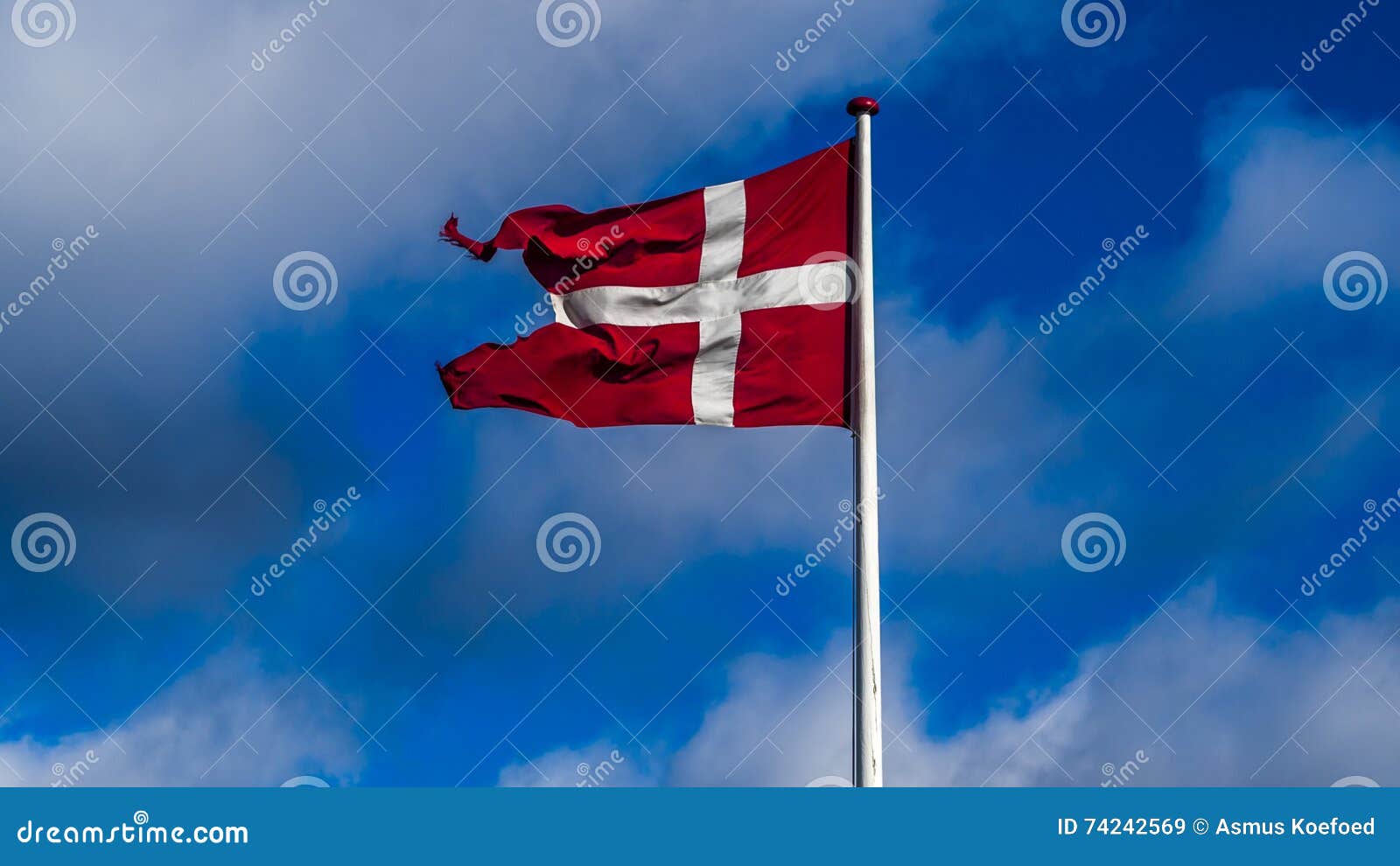 Danish Dannebrog In Front Of Hirtshals Lighthouse Royalty-Free Stock ...