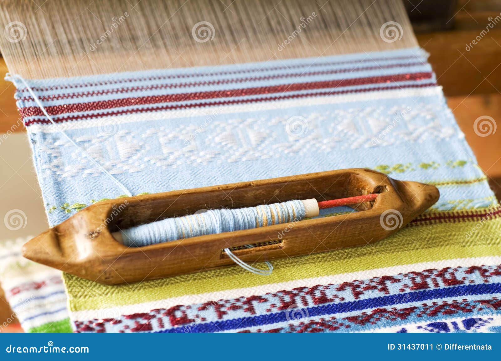 Navetta di tessitura immagine stock. Immagine di arte - 31437011