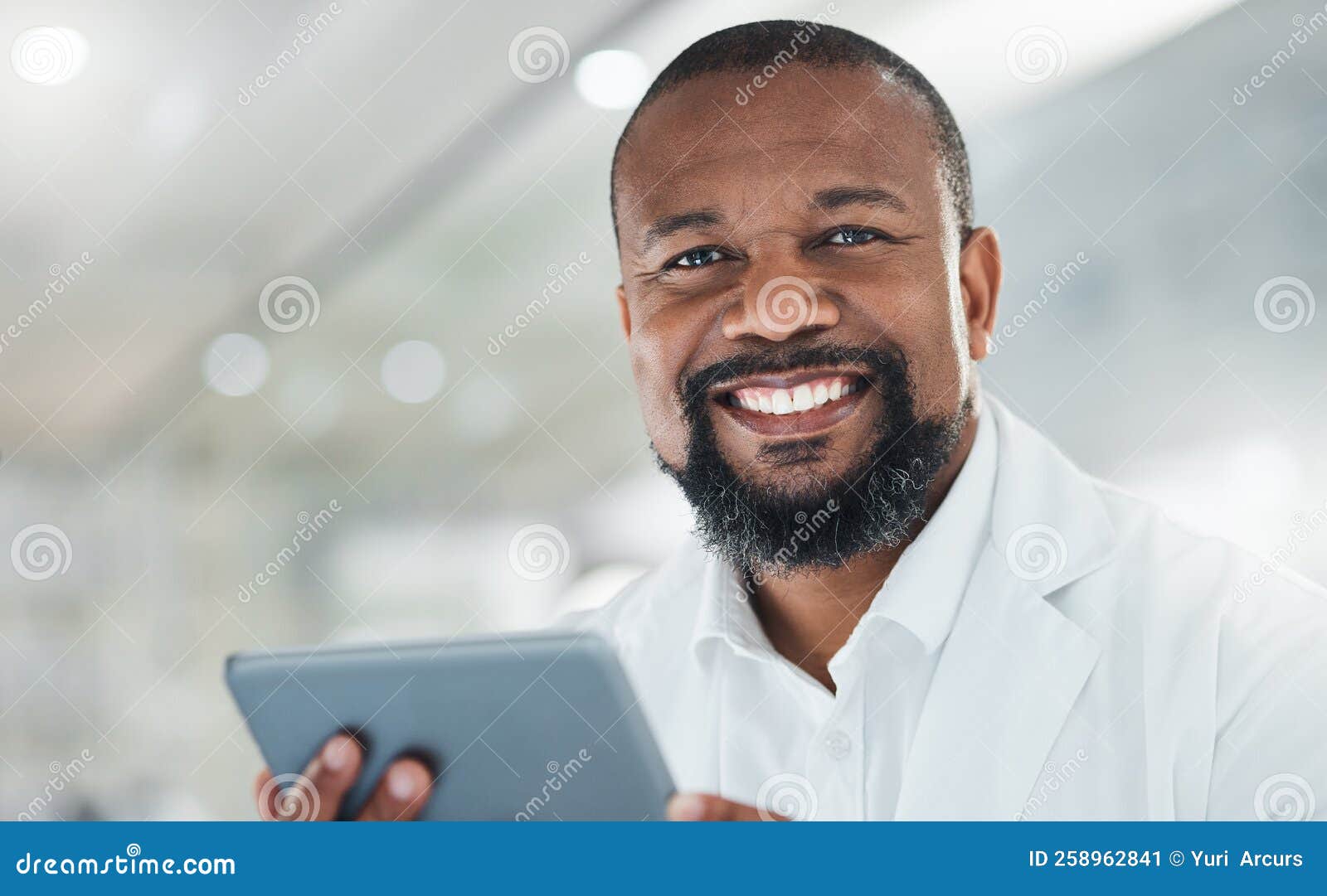 Navigating the Latest Case. a Male Scientist Using a Digital Tablet ...