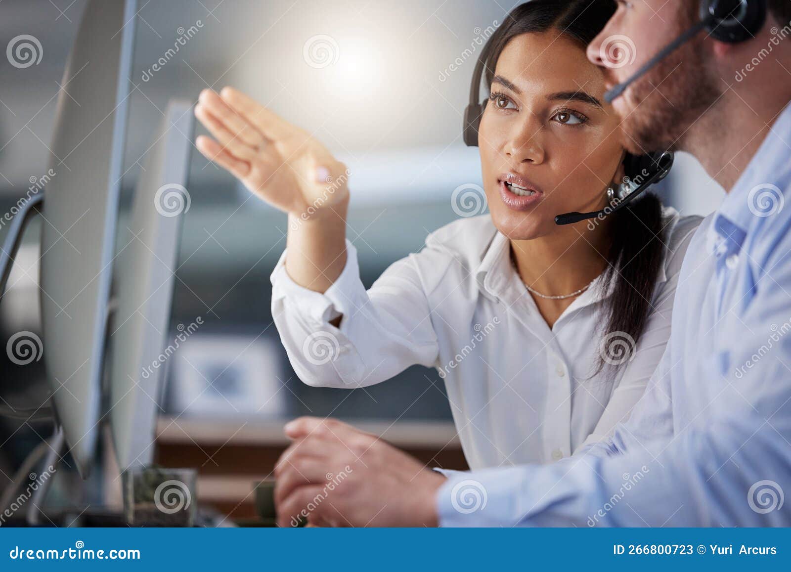 Navigating Their Way To the Right Solutions. Two Call Centre Agents ...