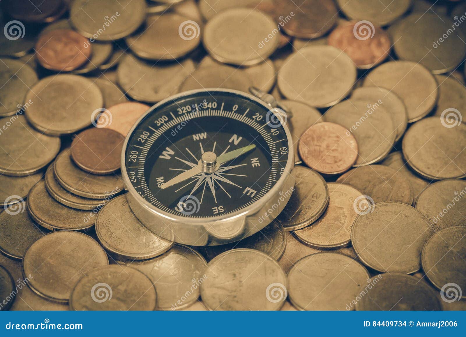 Navigation Compass with Coins Money , Financial Stock Photo - Image of ...