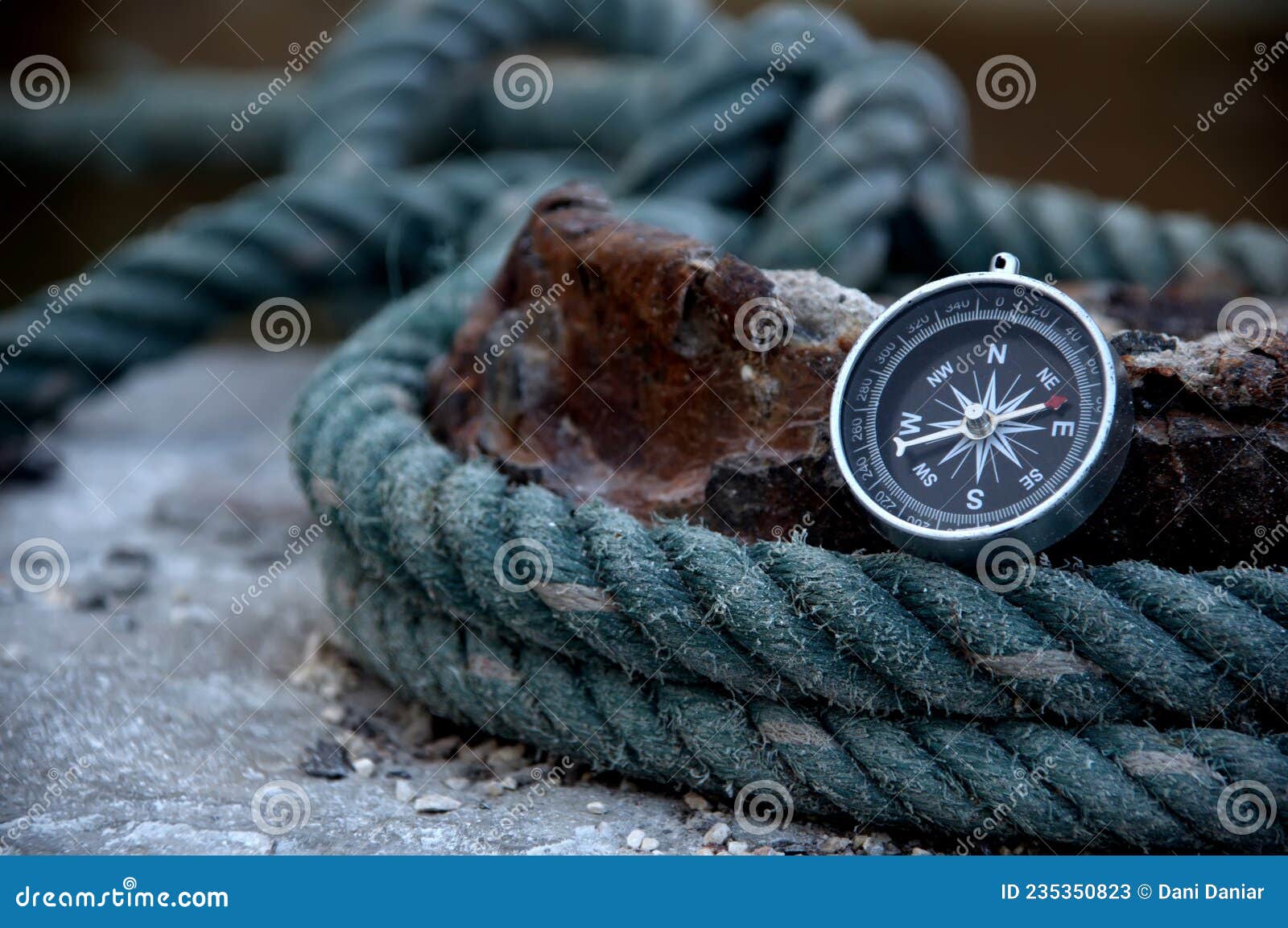 Navigation Compass in Harbor with Big Rope Around it Stock Image ...