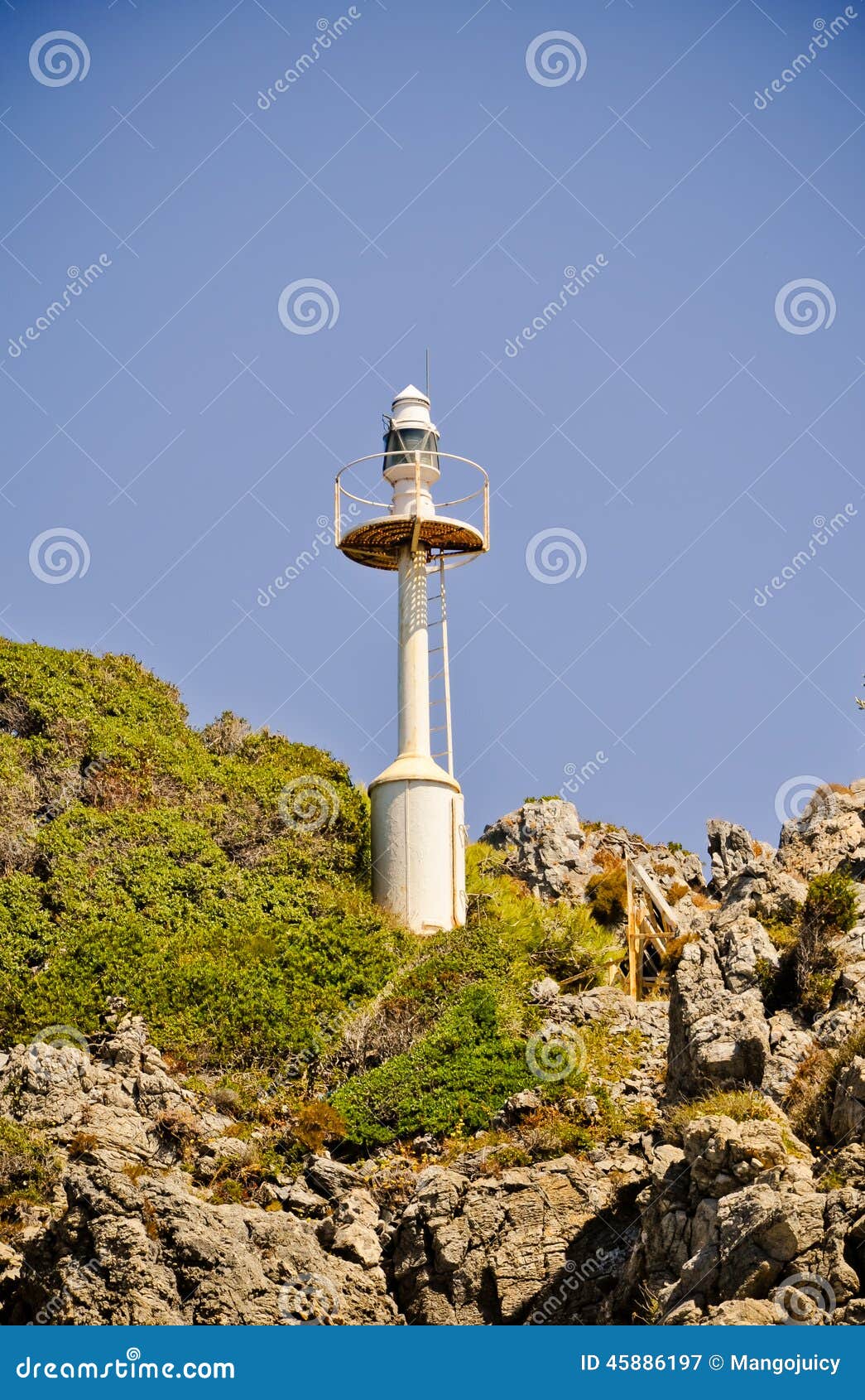Navigation. Lighthouse on the Rocks Stock Image - Image of seaside ...
