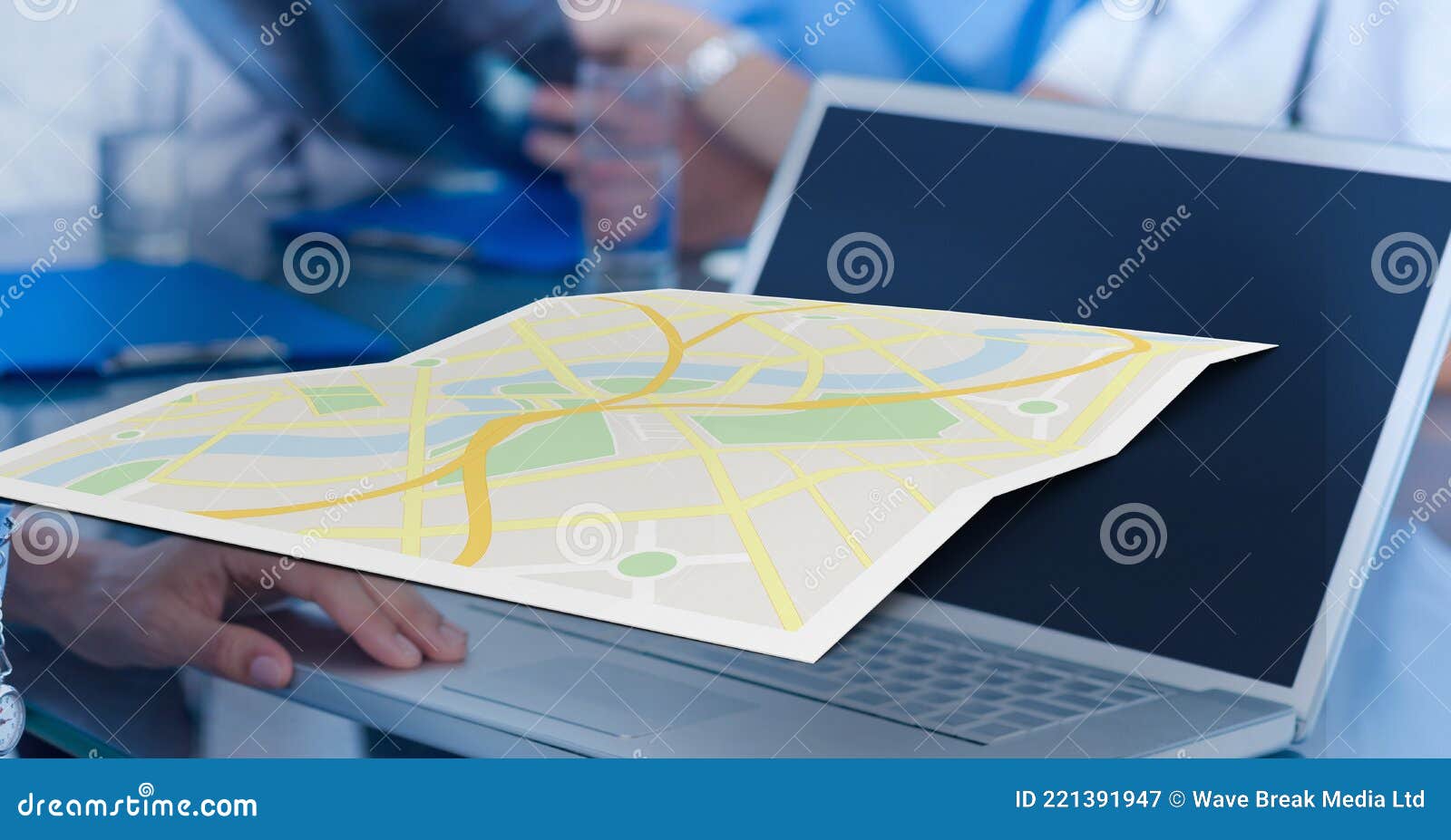 Navigation Map Over Against Mid Section of Man Using Laptop at Office ...