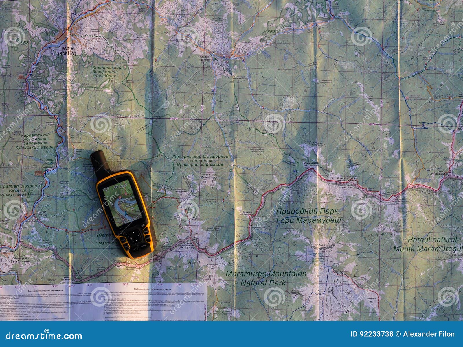 Navigator on paper map stock photo. Image of location - 92233738