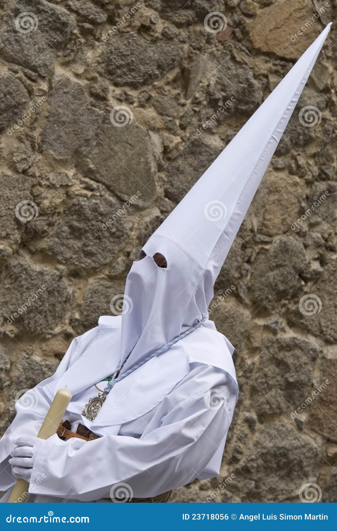 Nazarene Wearing A Capirote And Carrying A Cross Stock Image ...