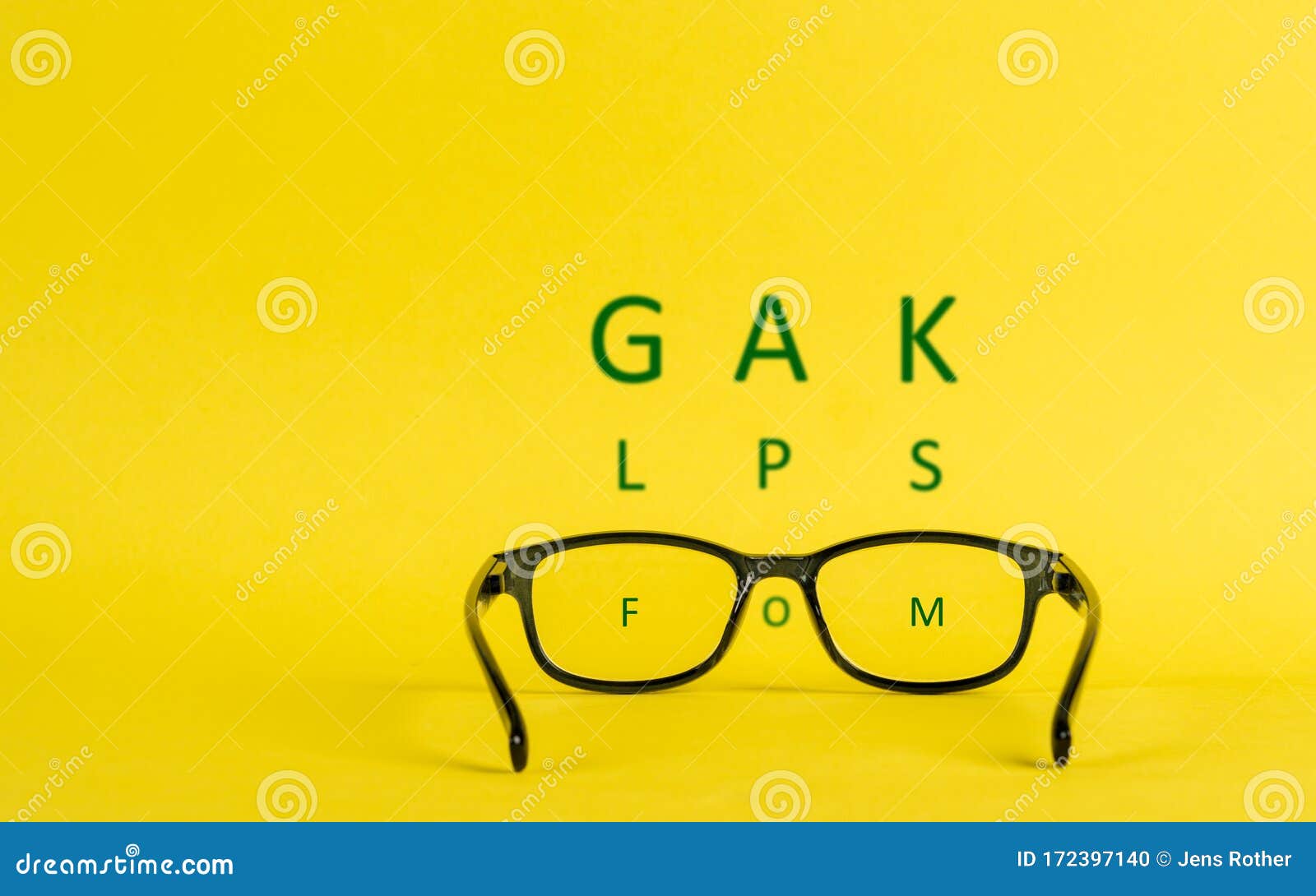 Nearsightedness Depicted with Glasses and Blurred Letters Stock Photo ...
