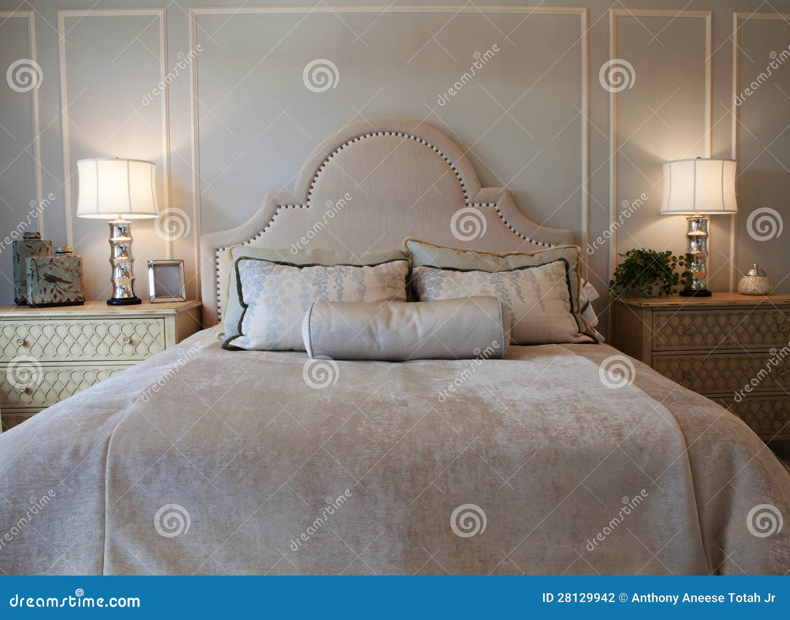 Neat bedroom stock photo. Image of lamps, headboard, decor - 28129942