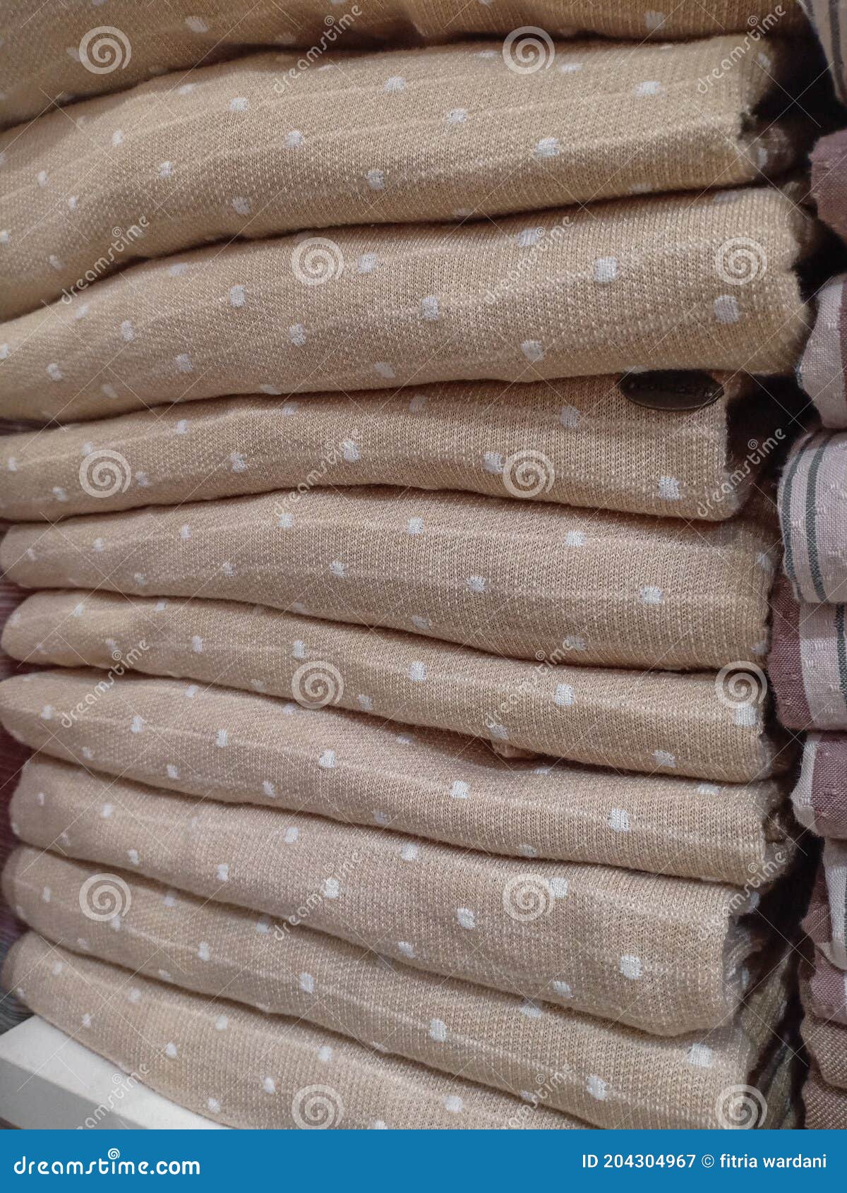 Neat rows of clothes stock image. Image of brown, wool - 204304967