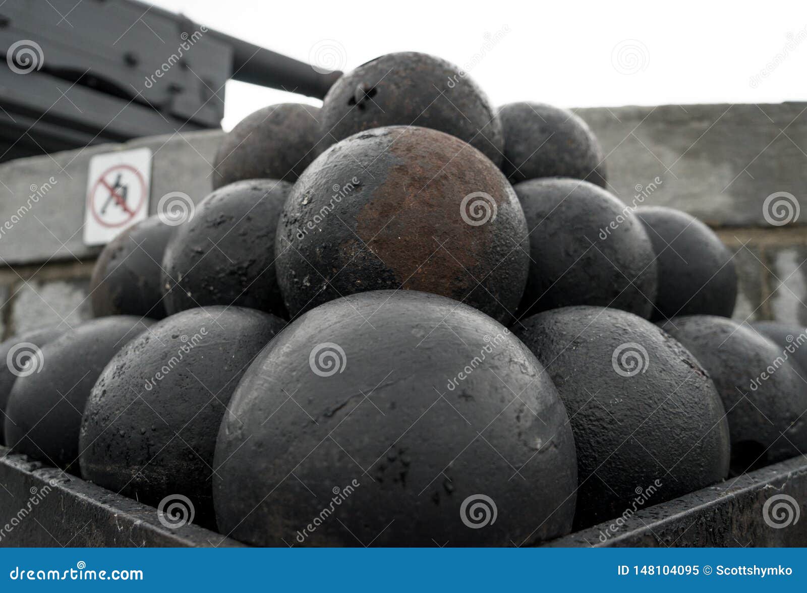 A Stack of Old Cannon Balls at a Fort Stock Image - Image of rusty ...