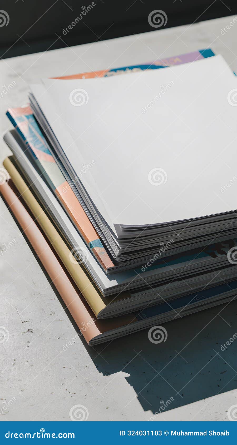 Neat Stack of Papers or Magazines with Blank Top Paper, Colorful ...