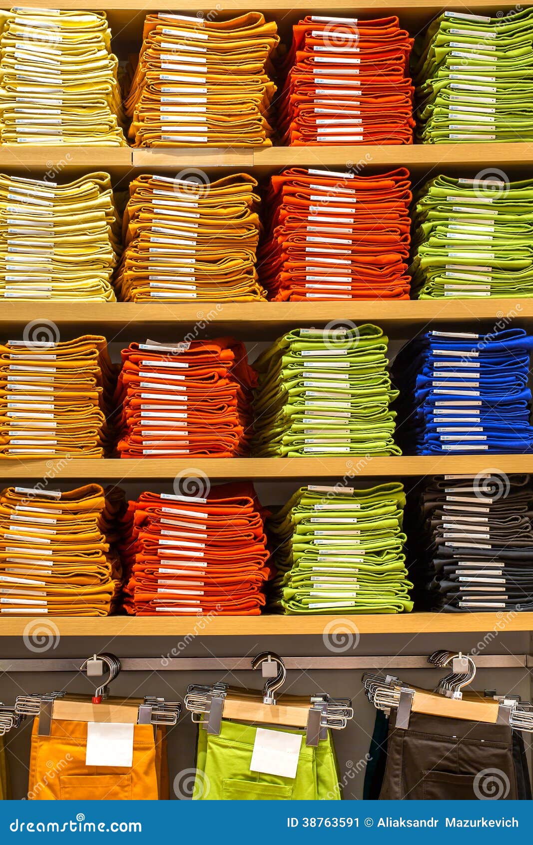Neat Stacks of Folded Clothing Stock Image - Image of shelves, shirt ...