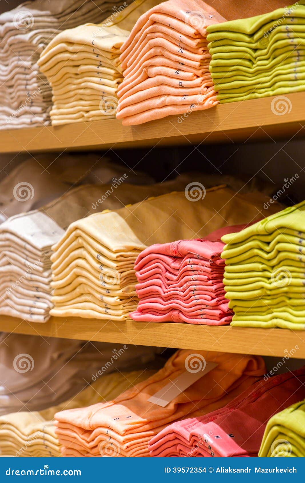 Neat Stacks of Folded Clothing Stock Photo - Image of neat, clothing ...